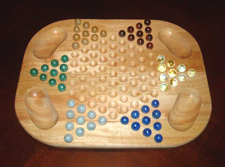 Board Game With Balls And Holes - Science Trends